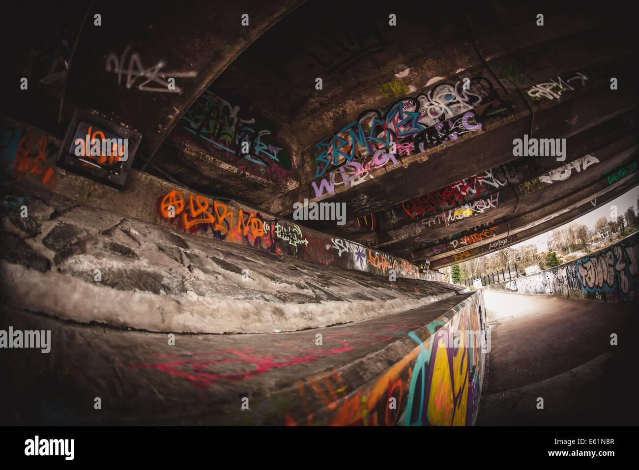 Graffiti street art under road bridge Stock Photo - Alamy