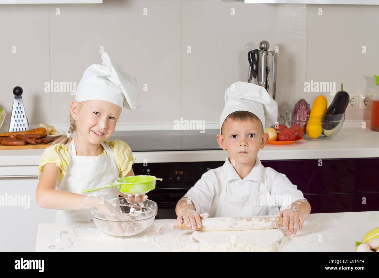 Adorable Kid Chefs Baking Something to Eat in the Kitchen Stock Photo ...