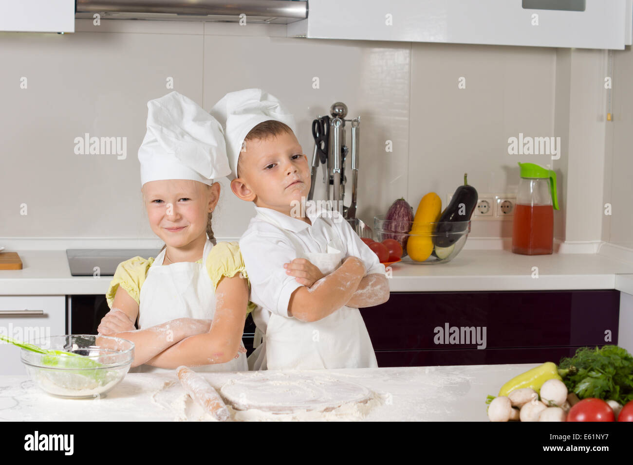 Confident Cute Kid Chefs Making Food to Eat in the Kitchen Stock Photo ...