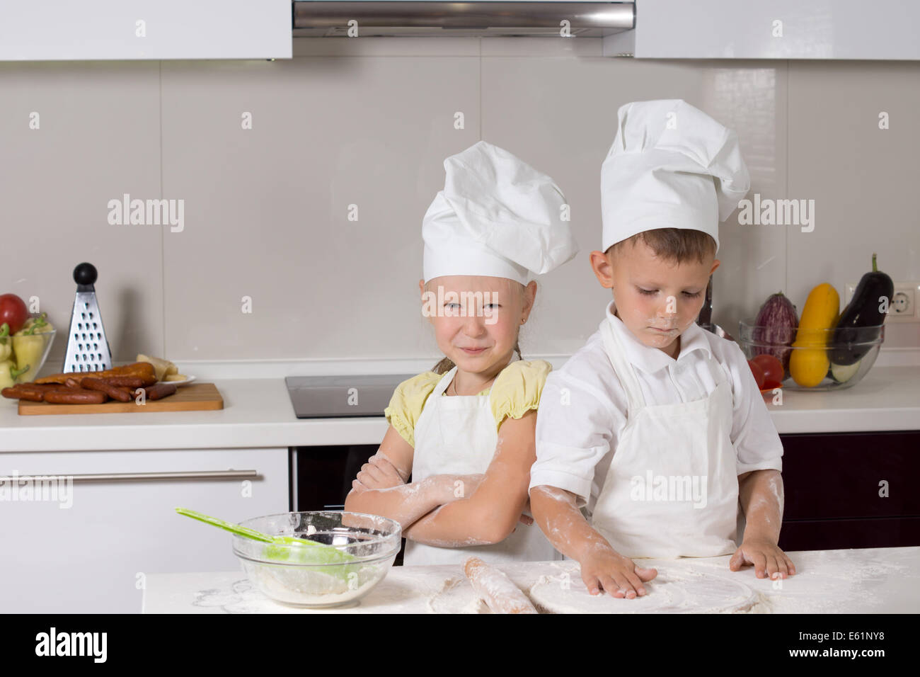 Cute Little Chefs Making Something to Eat in the Kitchen Stock Photo ...