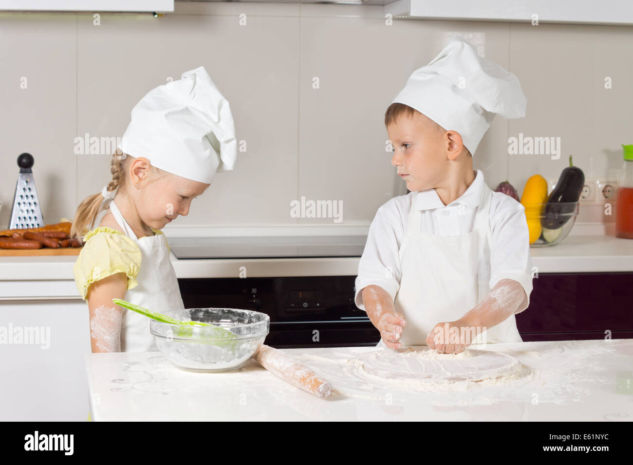 Caucasian Kid Chefs Playing in the Kitchen while Parents are Away Stock ...