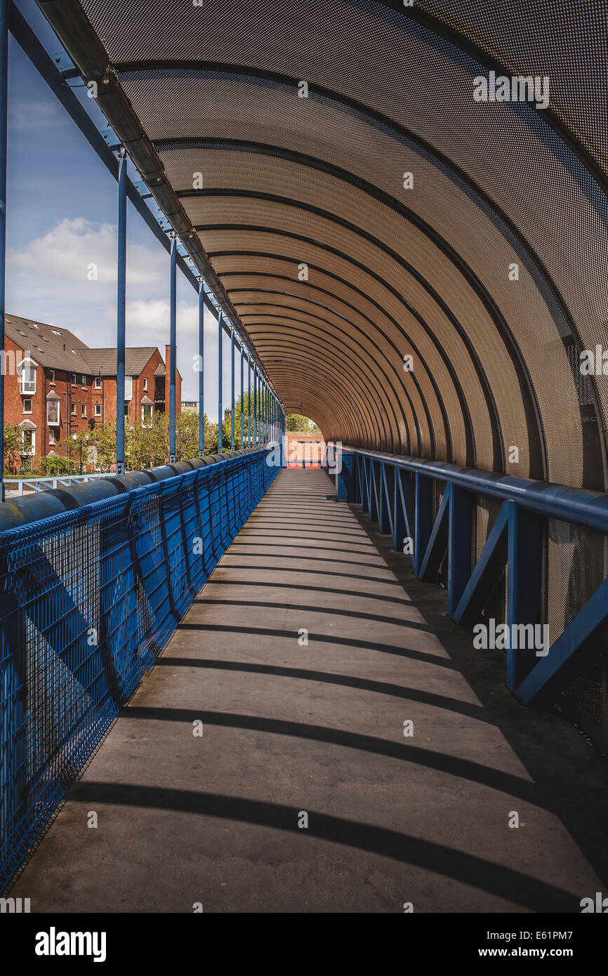 Crossing the foot bridge hi-res stock photography and images - Alamy