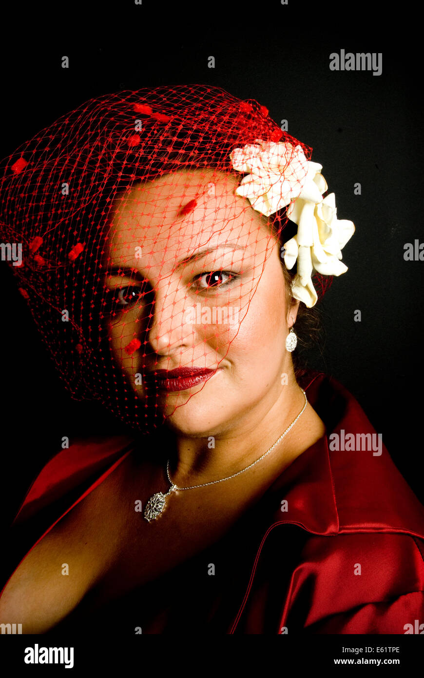 Woman in red veil Stock Photo - Alamy