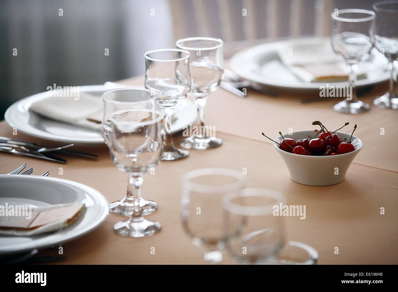 Shot with a dinner table with cherries in a restaurant Stock Photo - Alamy