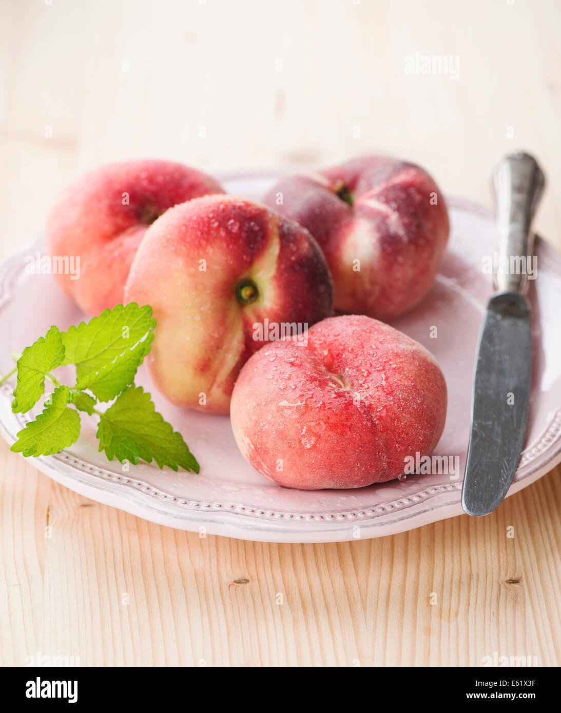 Flat peaches hi-res stock photography and images - Alamy