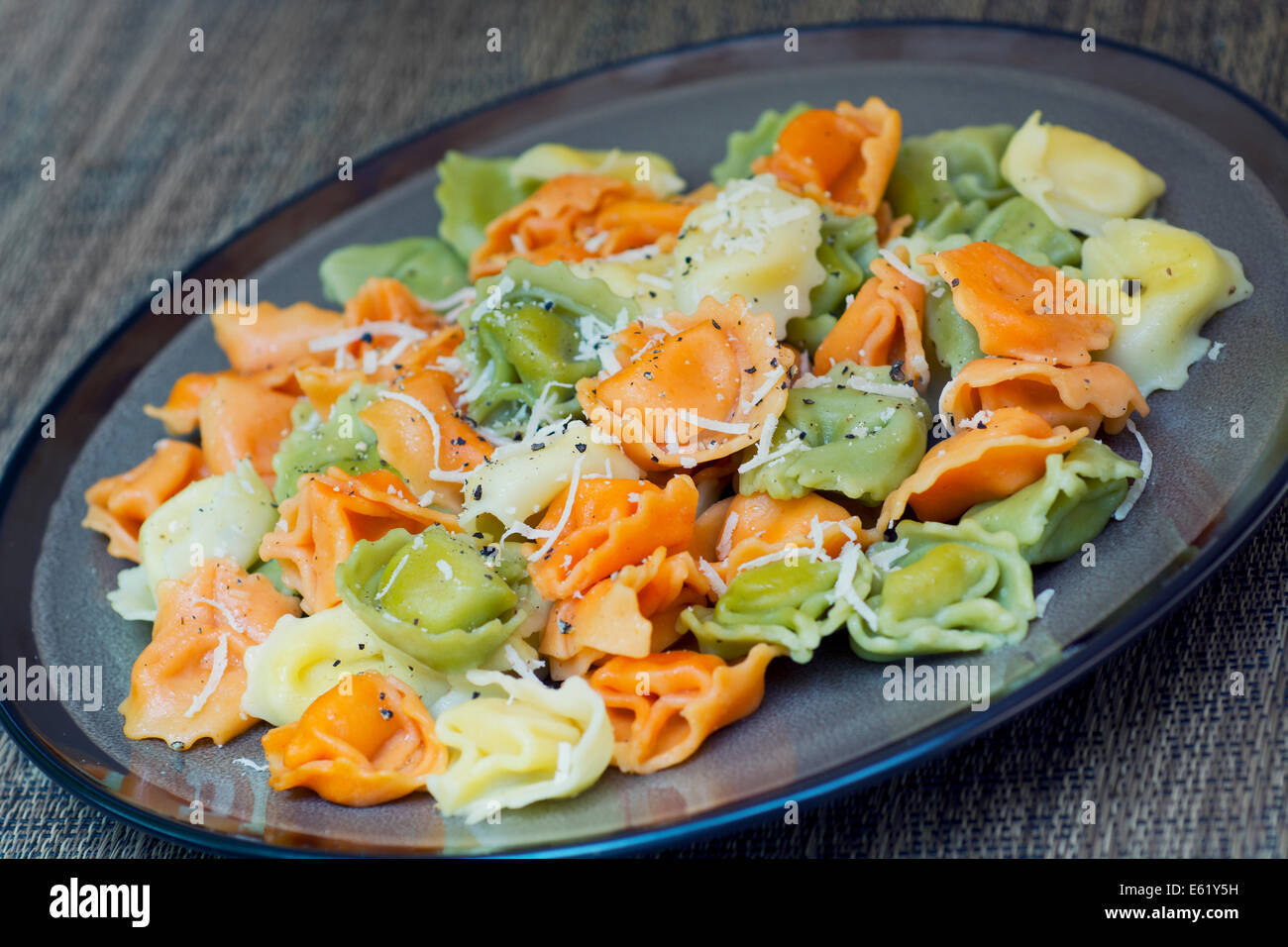 Plate of Tricolor Tortellini Stock Photo - Alamy