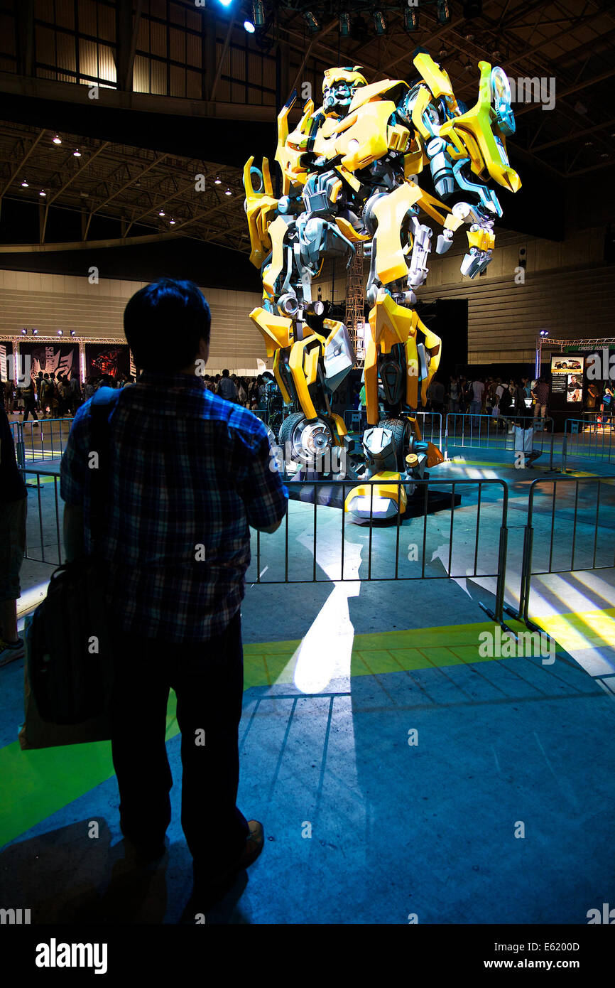 A visitor sees the 6 meter high full scale model of Bumblebee at the ...