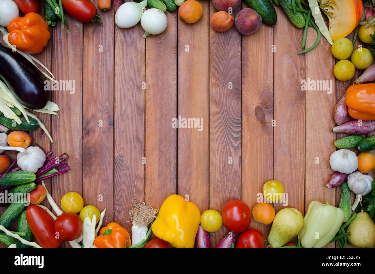 vegetables and fruits composition on wooden table Stock Photo - Alamy