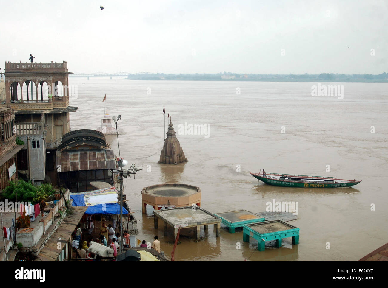 Varanasi, India. 11th Aug, 2014. A temple is submerged in the ...