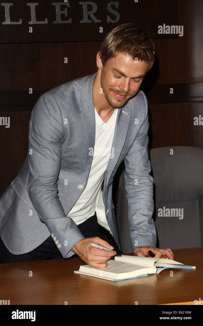 Los Angeles, California, USA. 11th Aug, 2014. Derek Hough signs copies ...