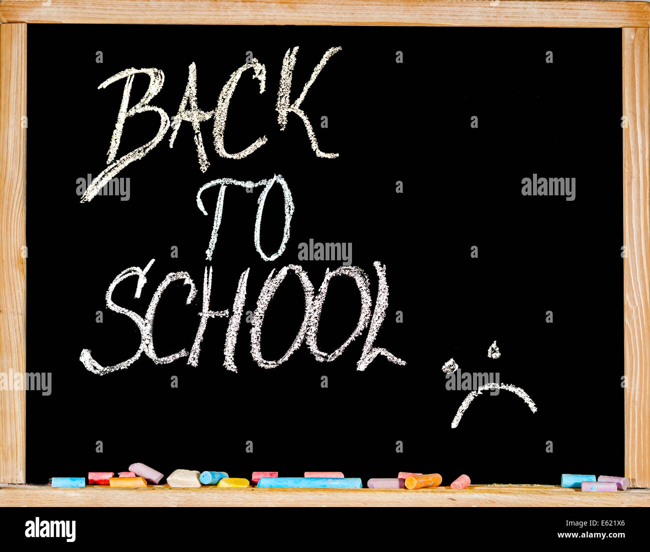 Back to school on black chalkboard and color chalk Stock Photo - Alamy