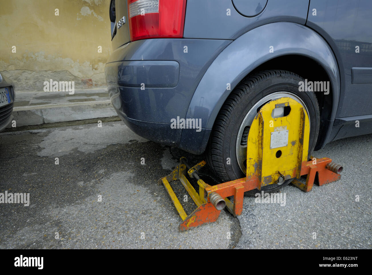 wheel clamp or wheel boot, immobiliser, wheel clamped or locked on ...