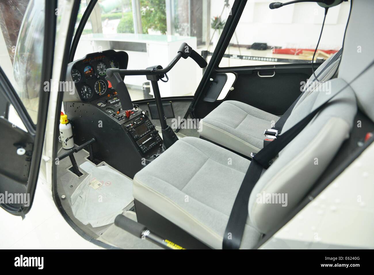 Hangzhou, China. 11th Aug, 2014. AUG 11 : People view a helicopter in ...