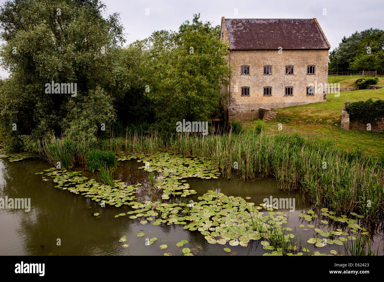 UK England, Dorset, Marnhull, King’s Mill and mill pond on River Cale ...