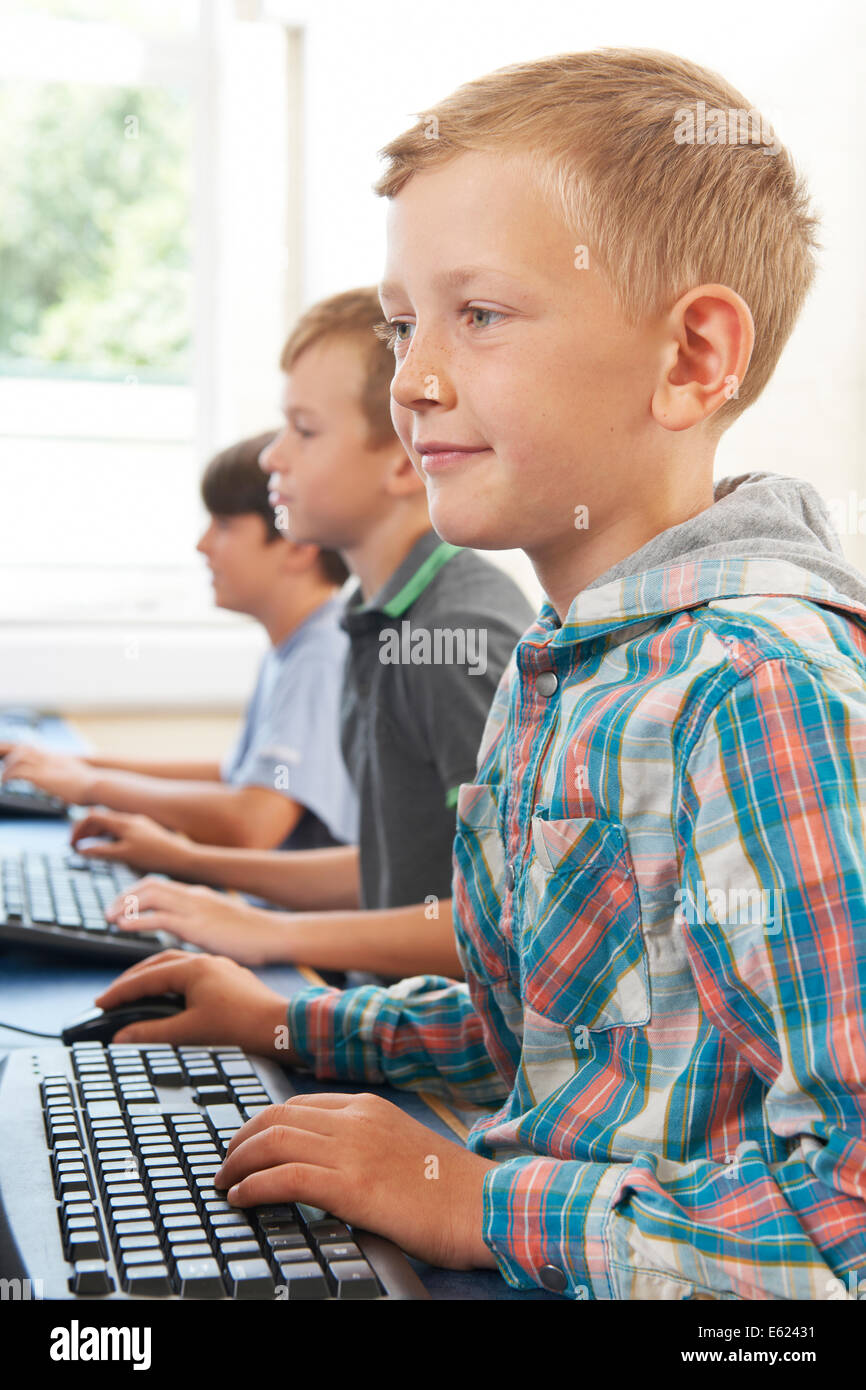 Group Of Male Elementary School Children In Computer Class Stock Photo ...