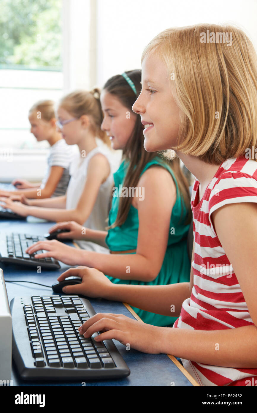 Group Of Female Elementary School Children In Computer Class Stock ...