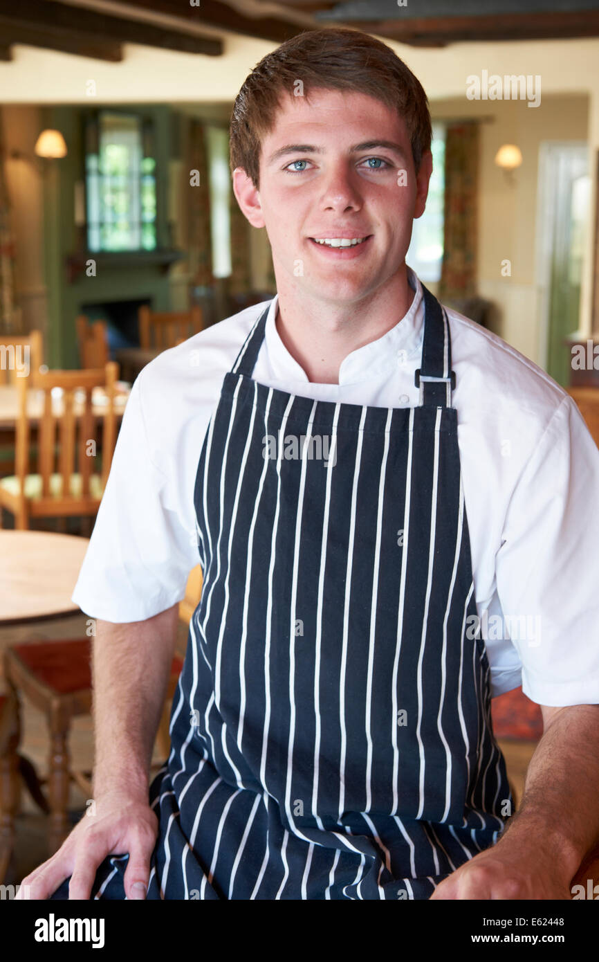 Male owner wearing apron hi-res stock photography and images - Alamy