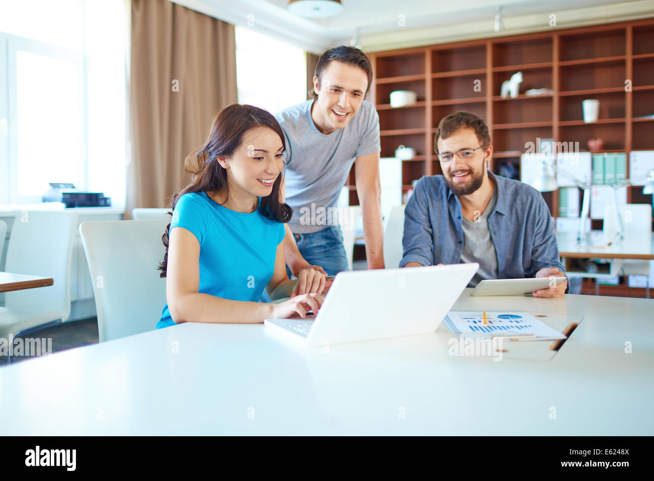 Group of business partners in casual networking together in office ...