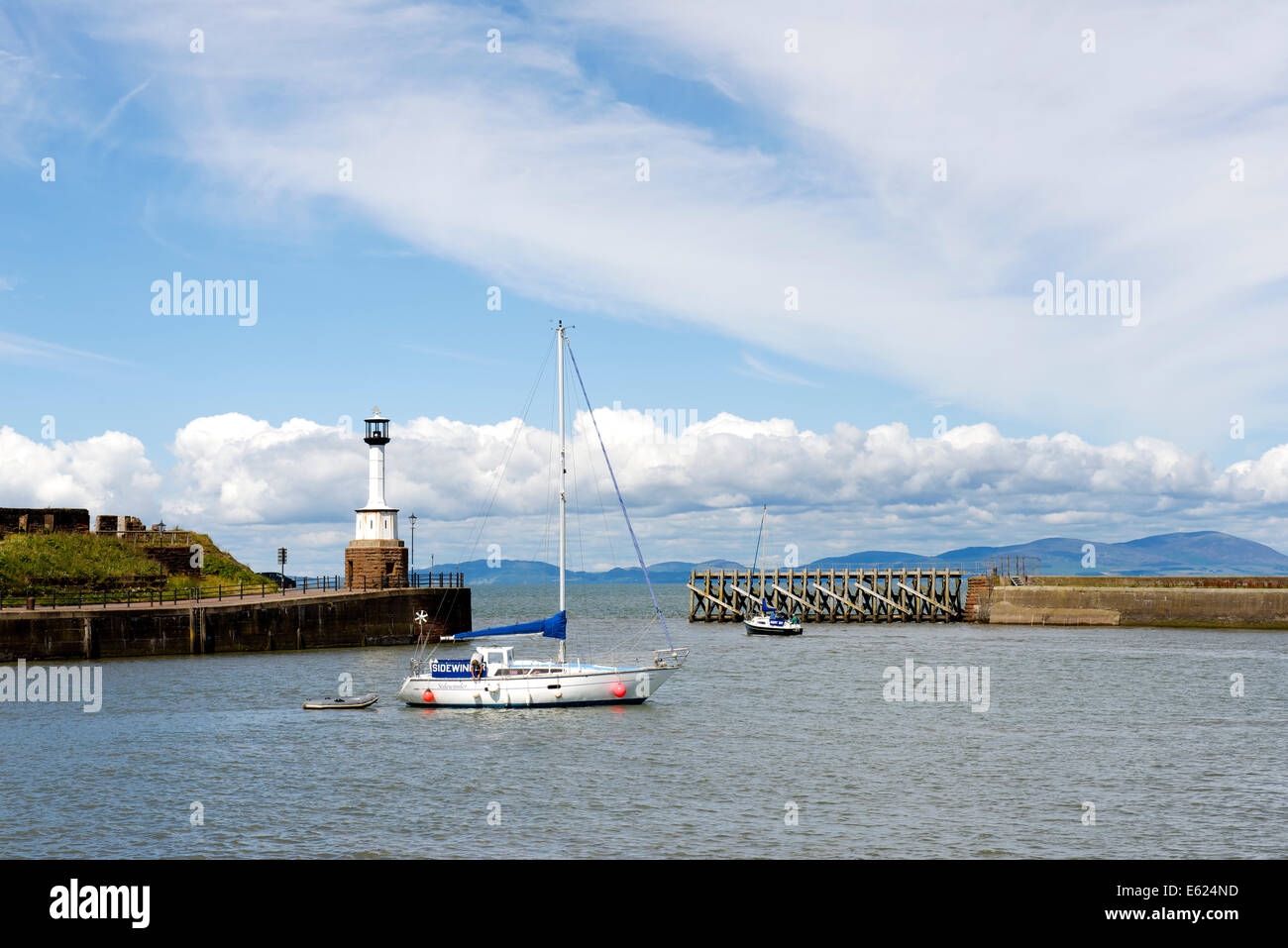 The lighthouse and harbour, Maryport, West Cumbria, England UK Stock ...