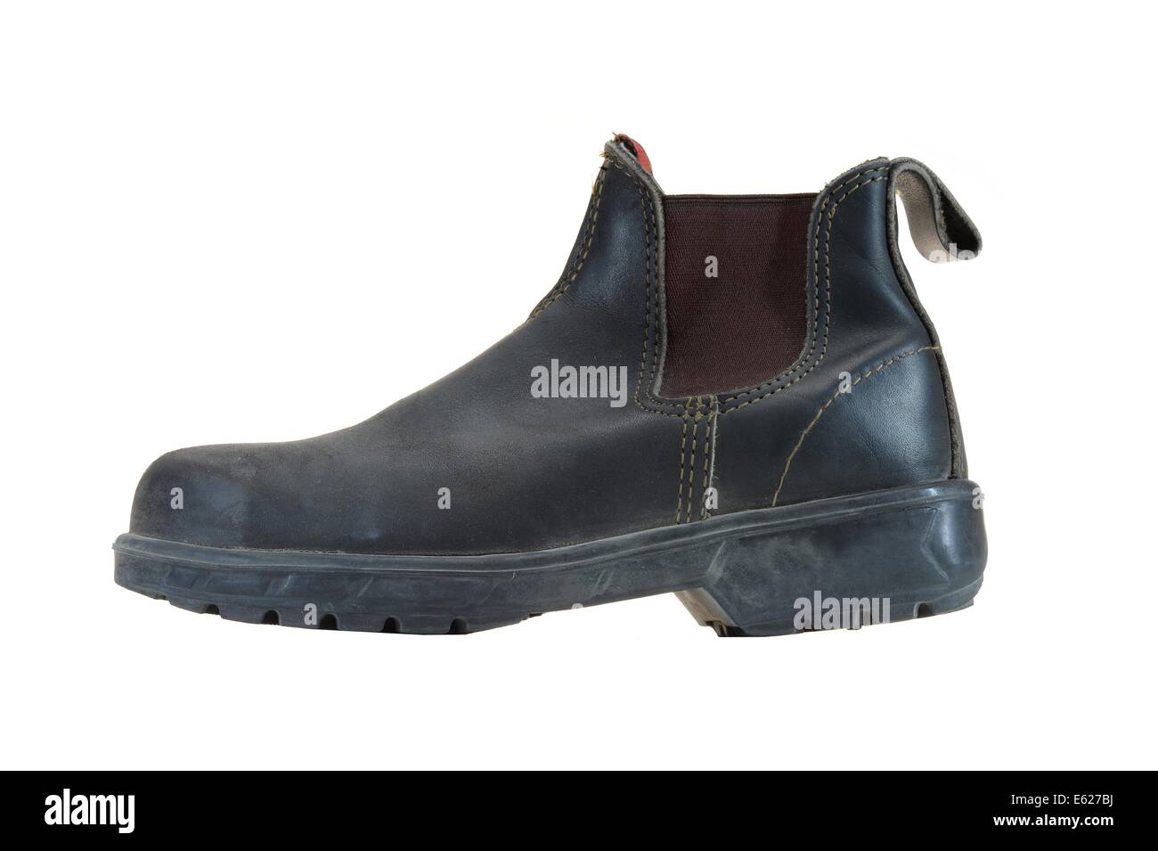 A close up shot of work boots Stock Photo - Alamy