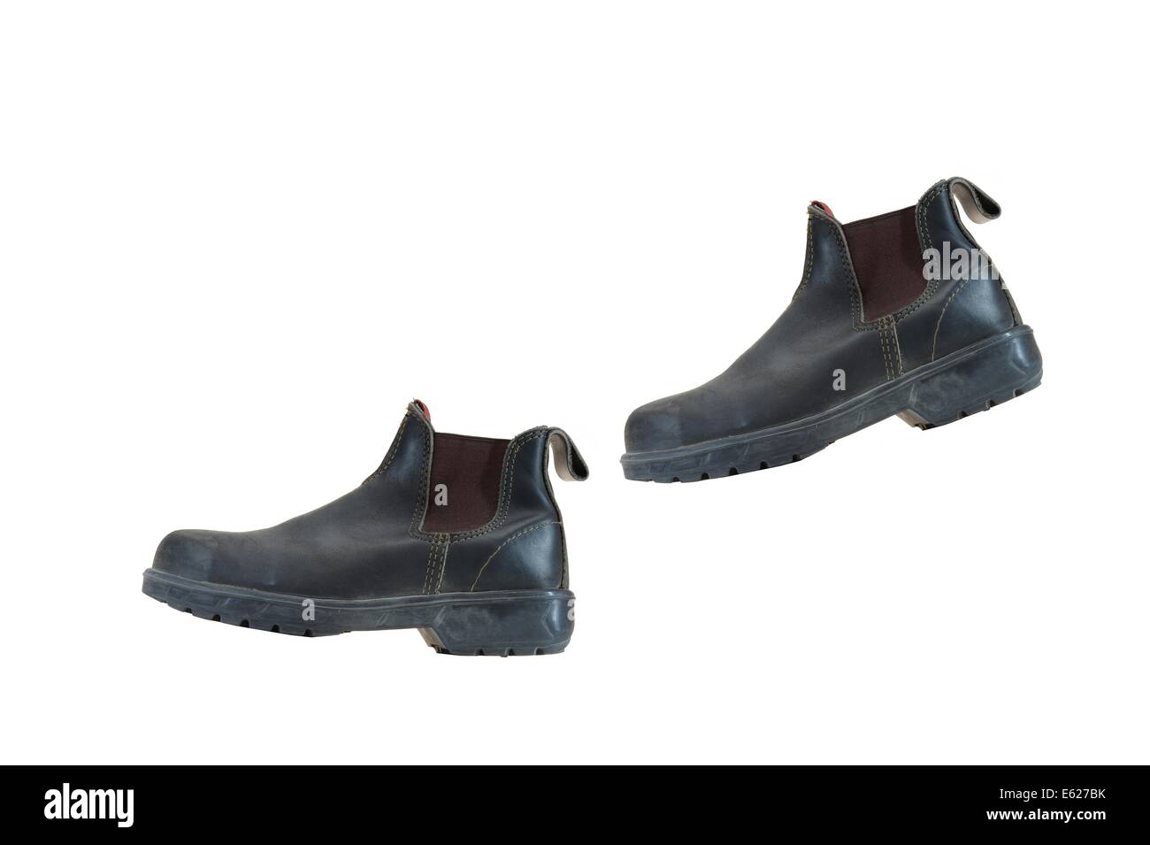 A close up shot of work boots Stock Photo - Alamy