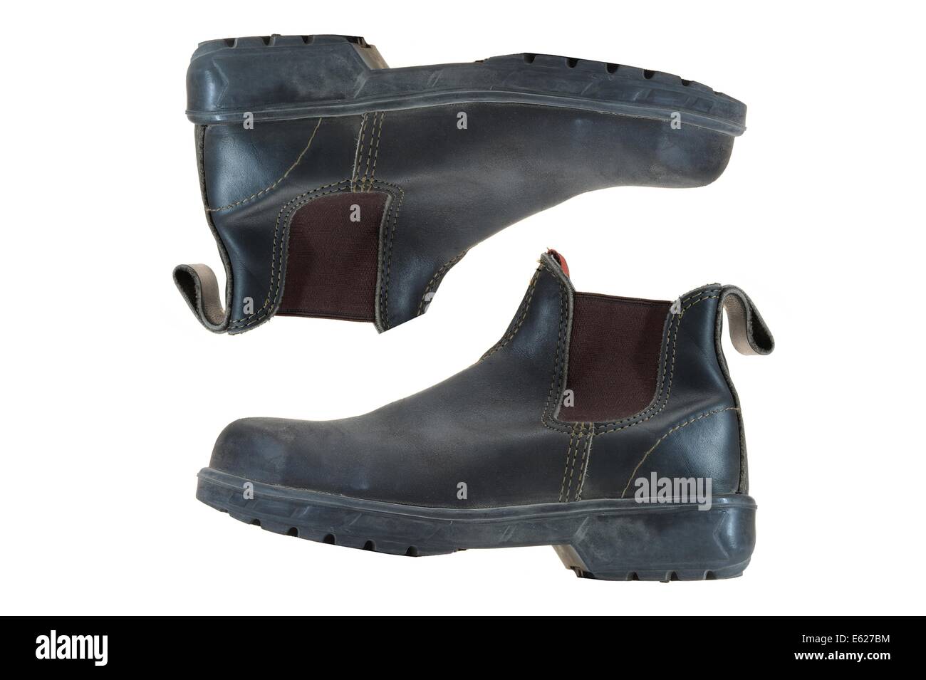 A close up shot of work boots Stock Photo - Alamy