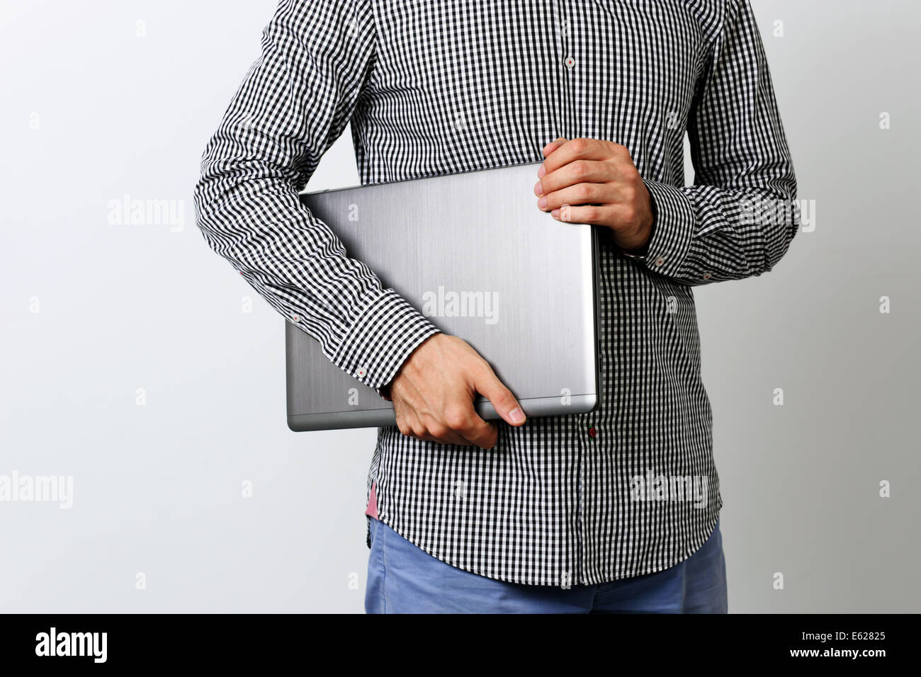 CLoseup portrait of a man with laptop Stock Photo - Alamy