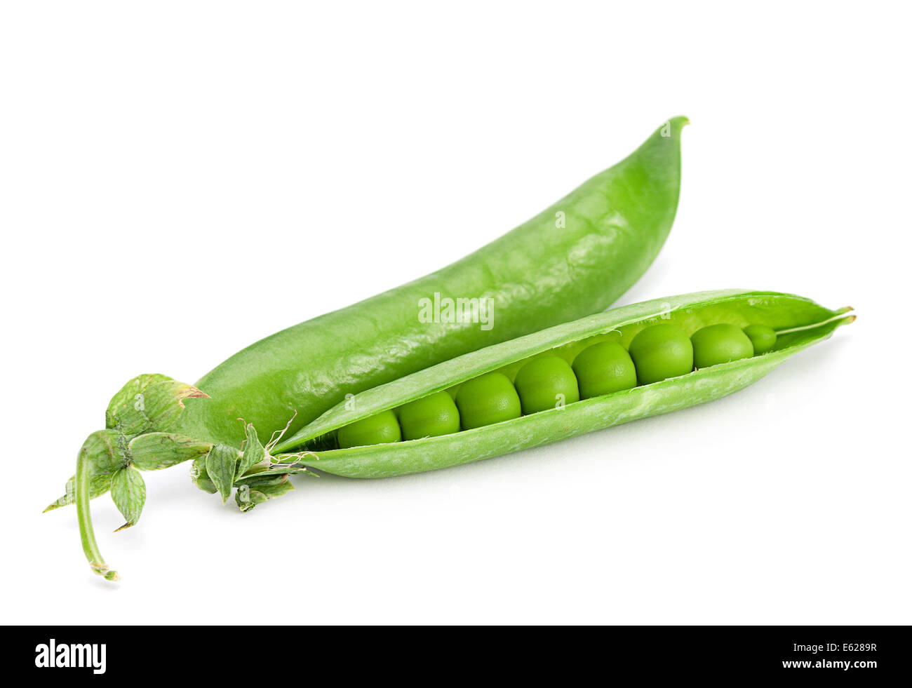Peas vegetable closeup isolated on white background Stock Photo - Alamy