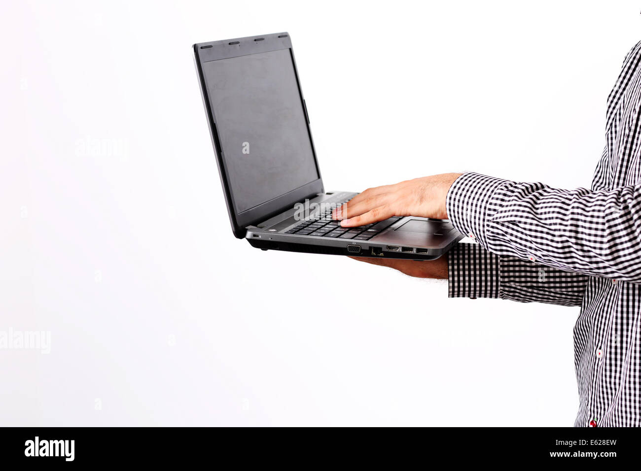 Side view portrait of a man using laptop Stock Photo - Alamy