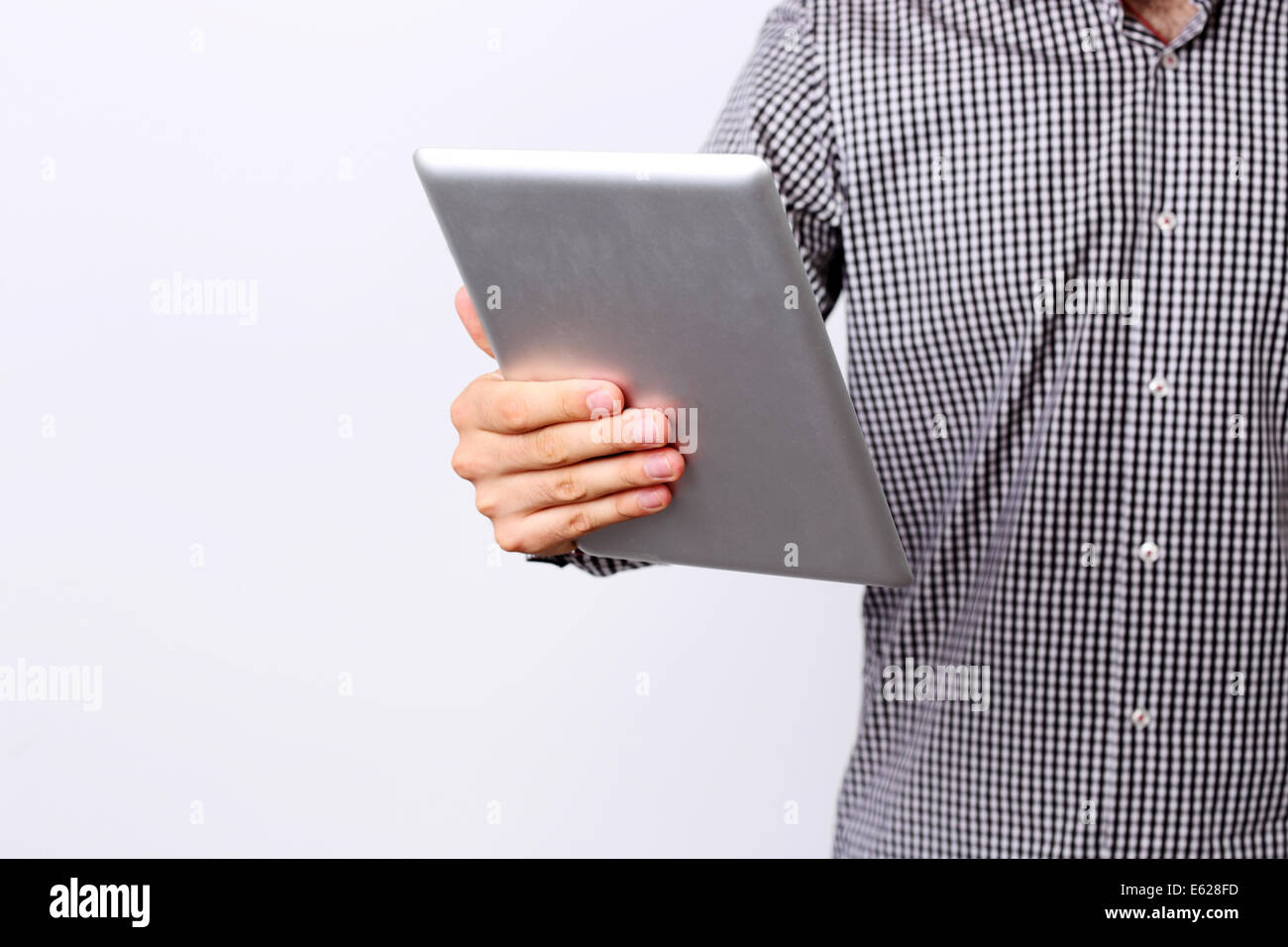Closeup portrait of a man holding tablet computer Stock Photo - Alamy