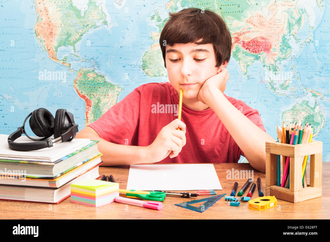 Boy thinking pencil hi-res stock photography and images - Alamy