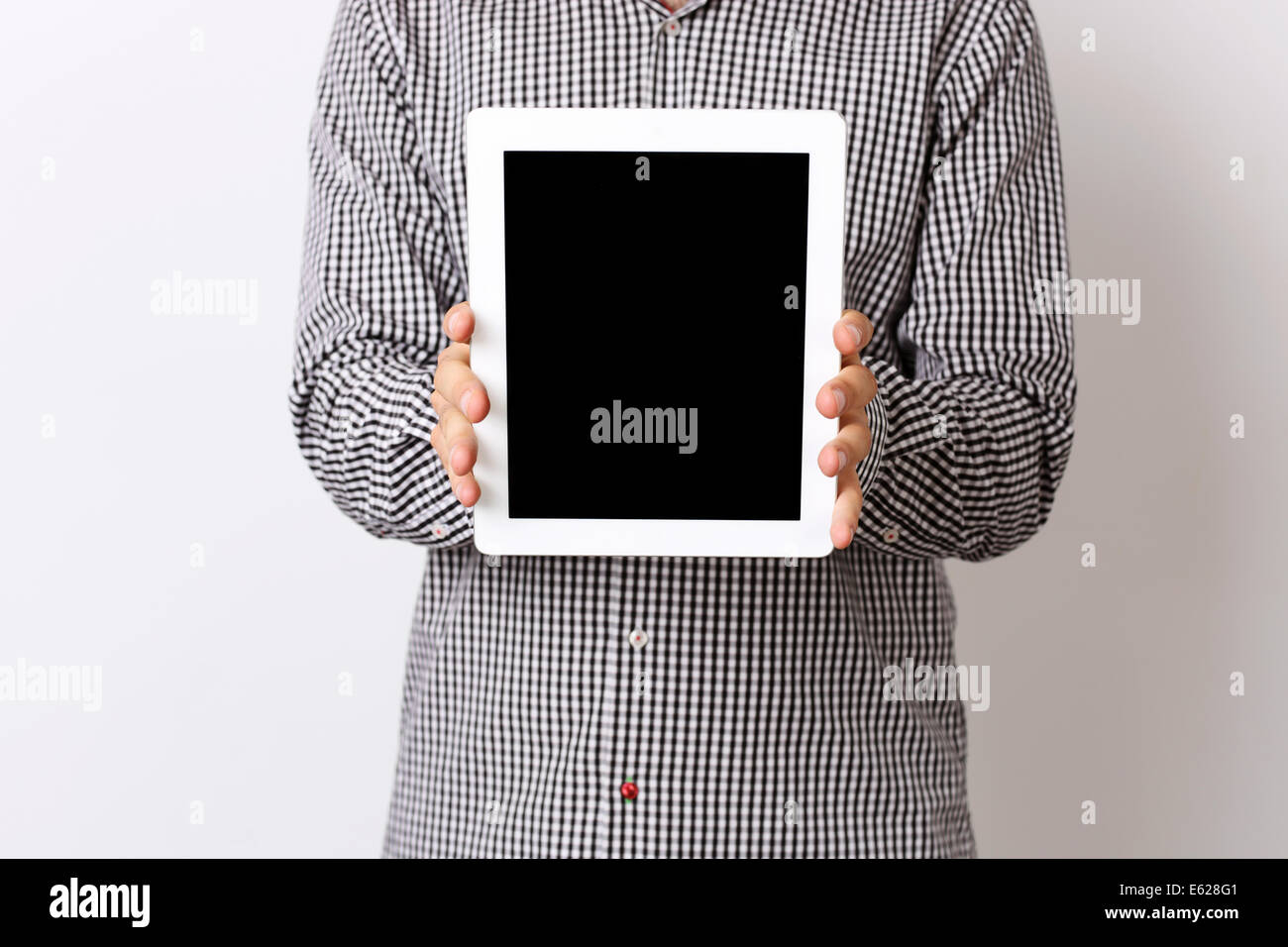 Closeup portrait of a man showing tablet comptuter screen Stock Photo ...