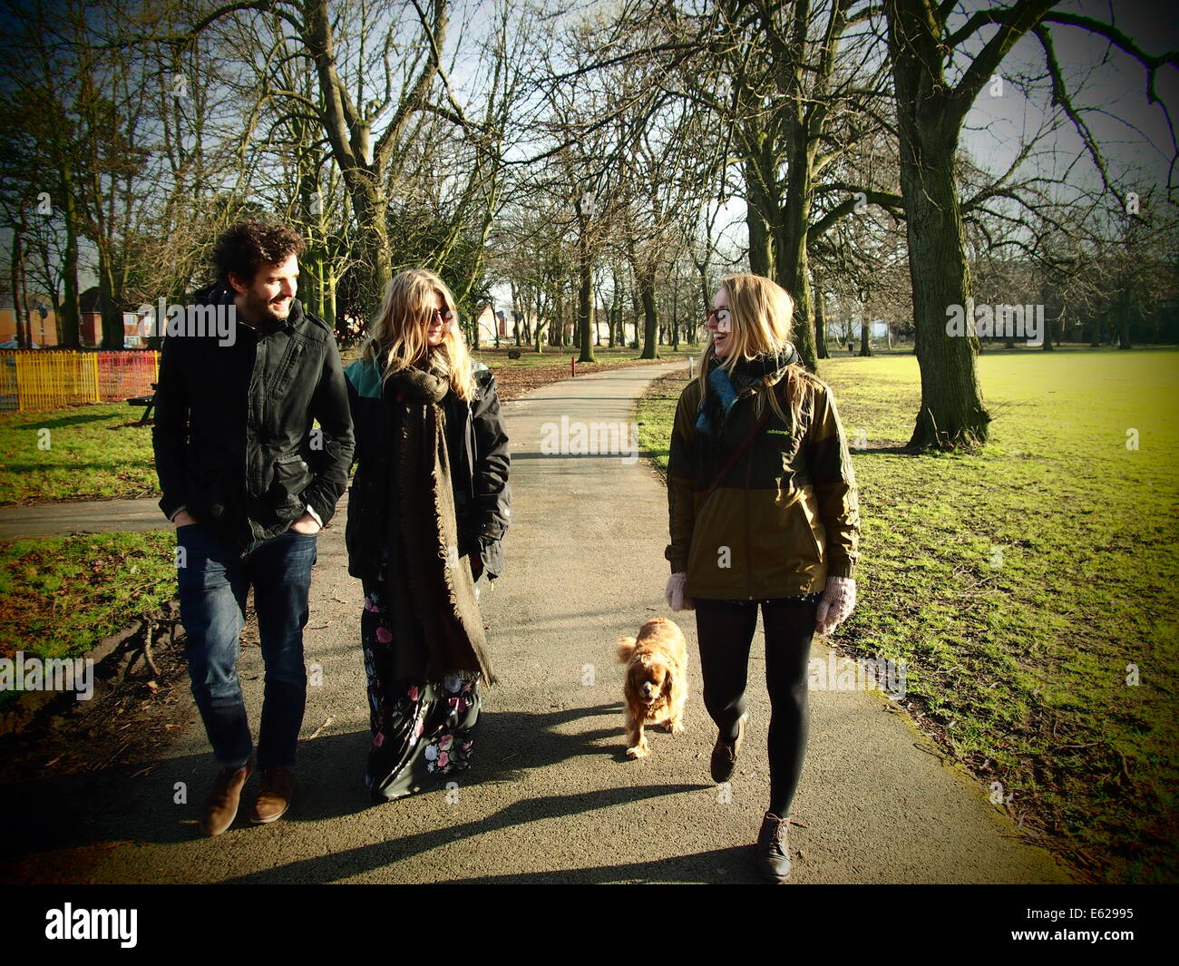 Walk in the park with friends Stock Photo - Alamy