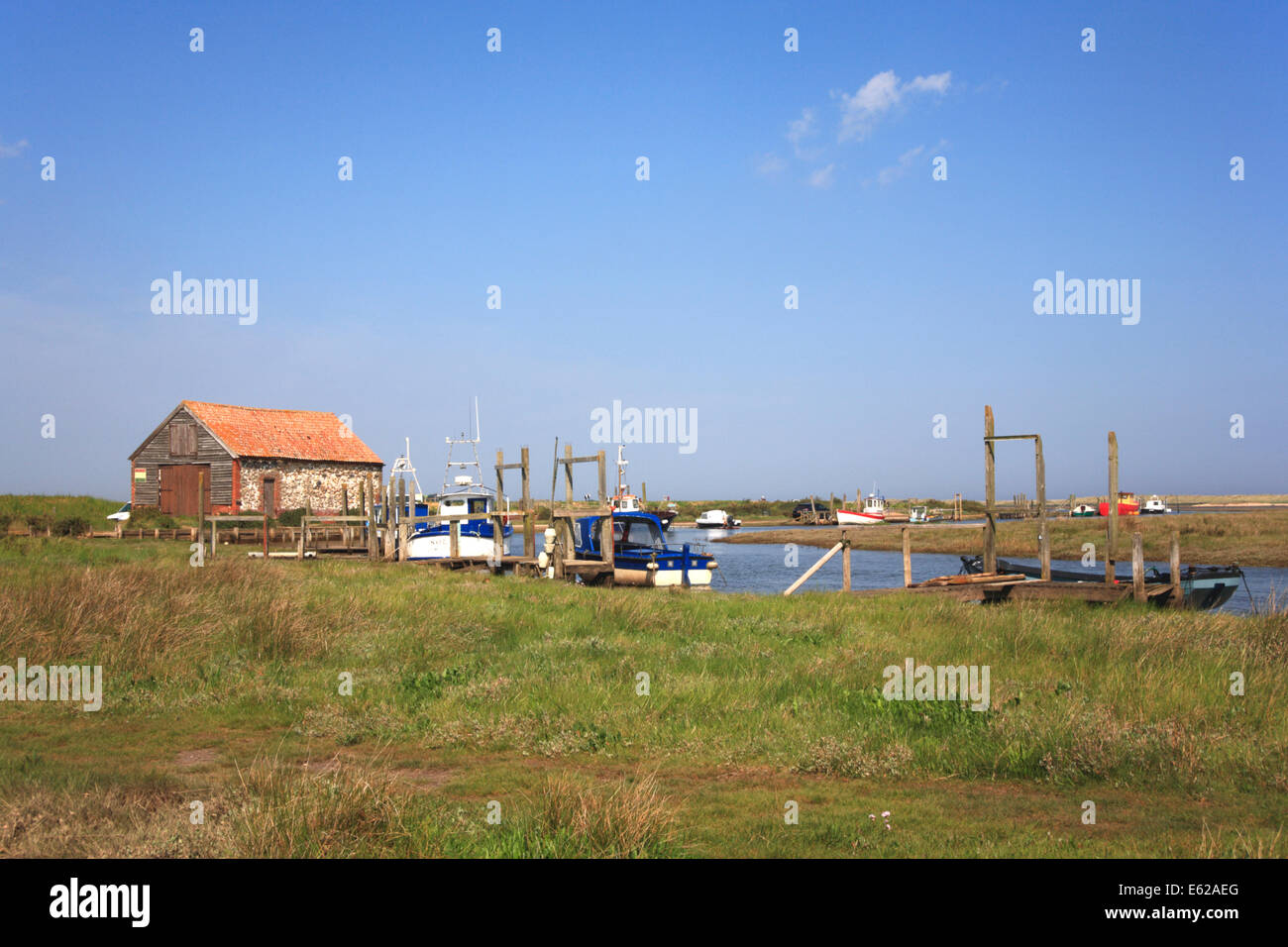 A view of the old coal barn and staithe at Thornham, North Norfolk ...