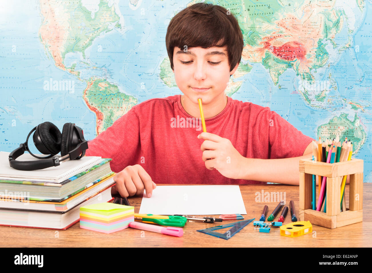 Boy thinking pencil hi-res stock photography and images - Alamy