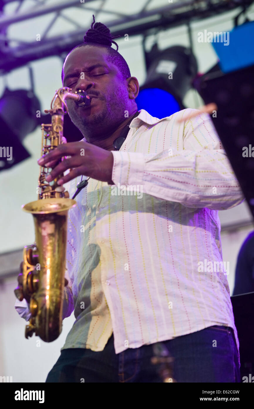 Sax player with Township Comets jazz band from South Africa performing ...