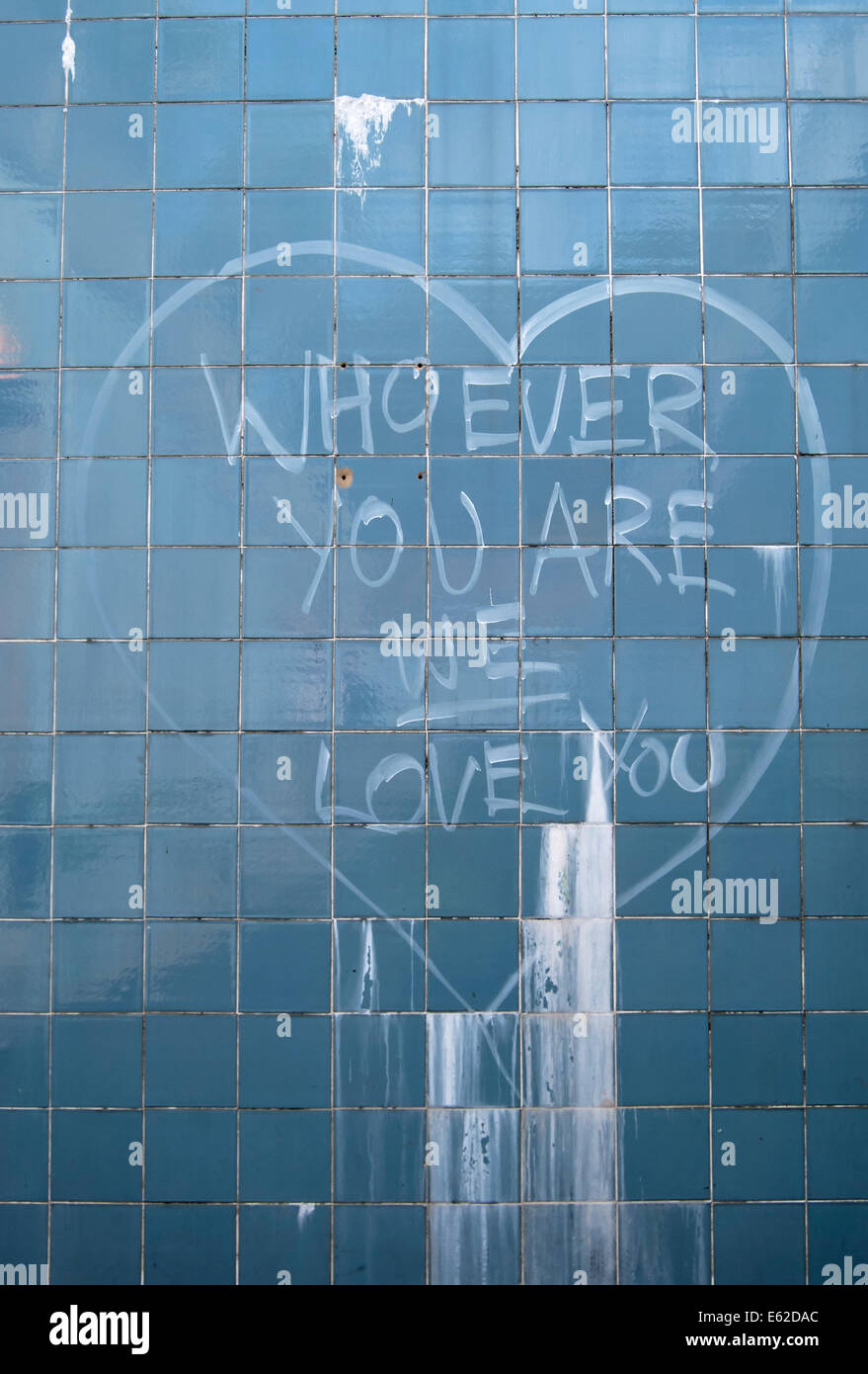 whoever you are we love you, graffiti on a subway wall, hammersmith ...