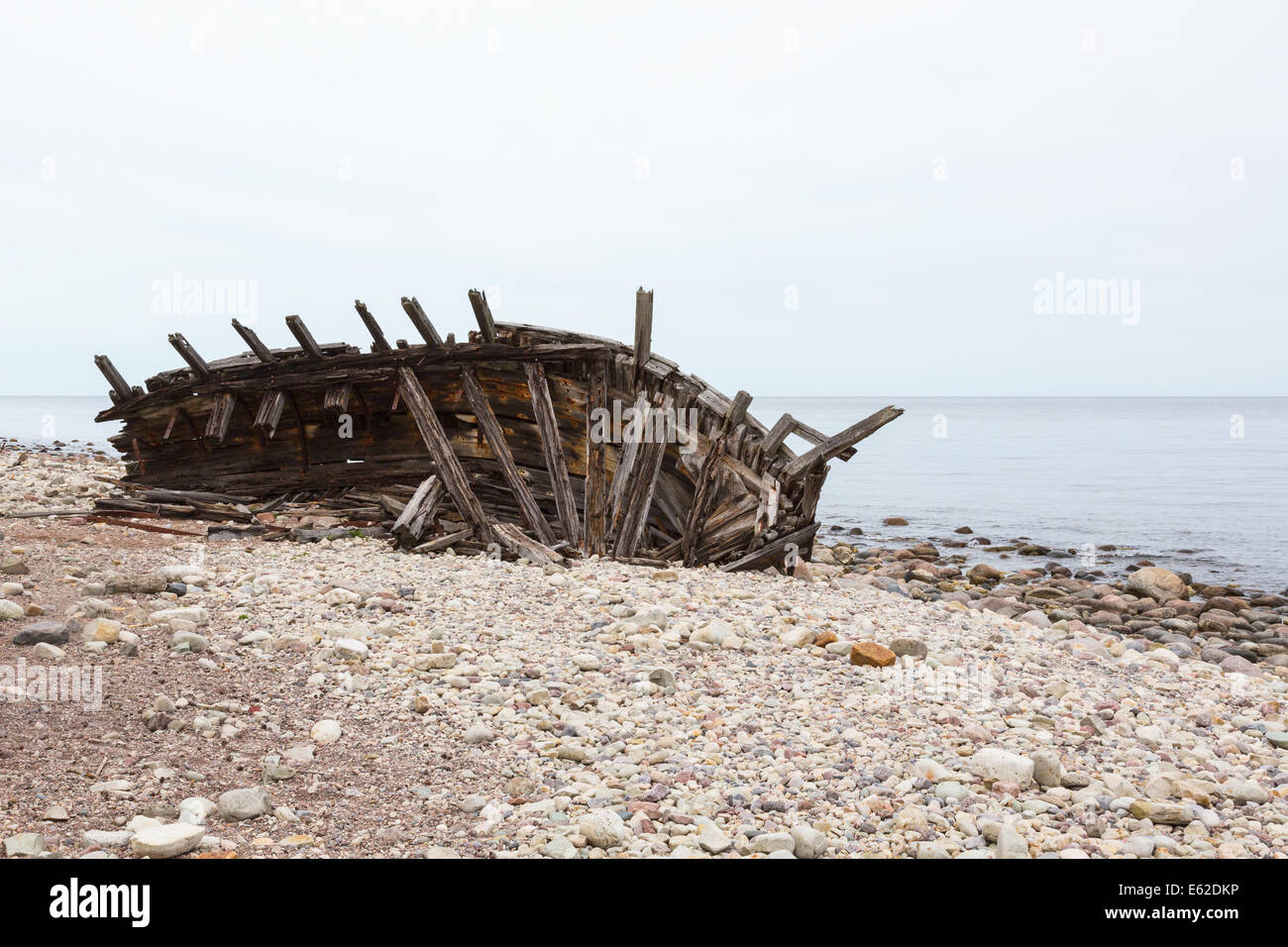 Old shipwreck on a beach Stock Photo - Alamy