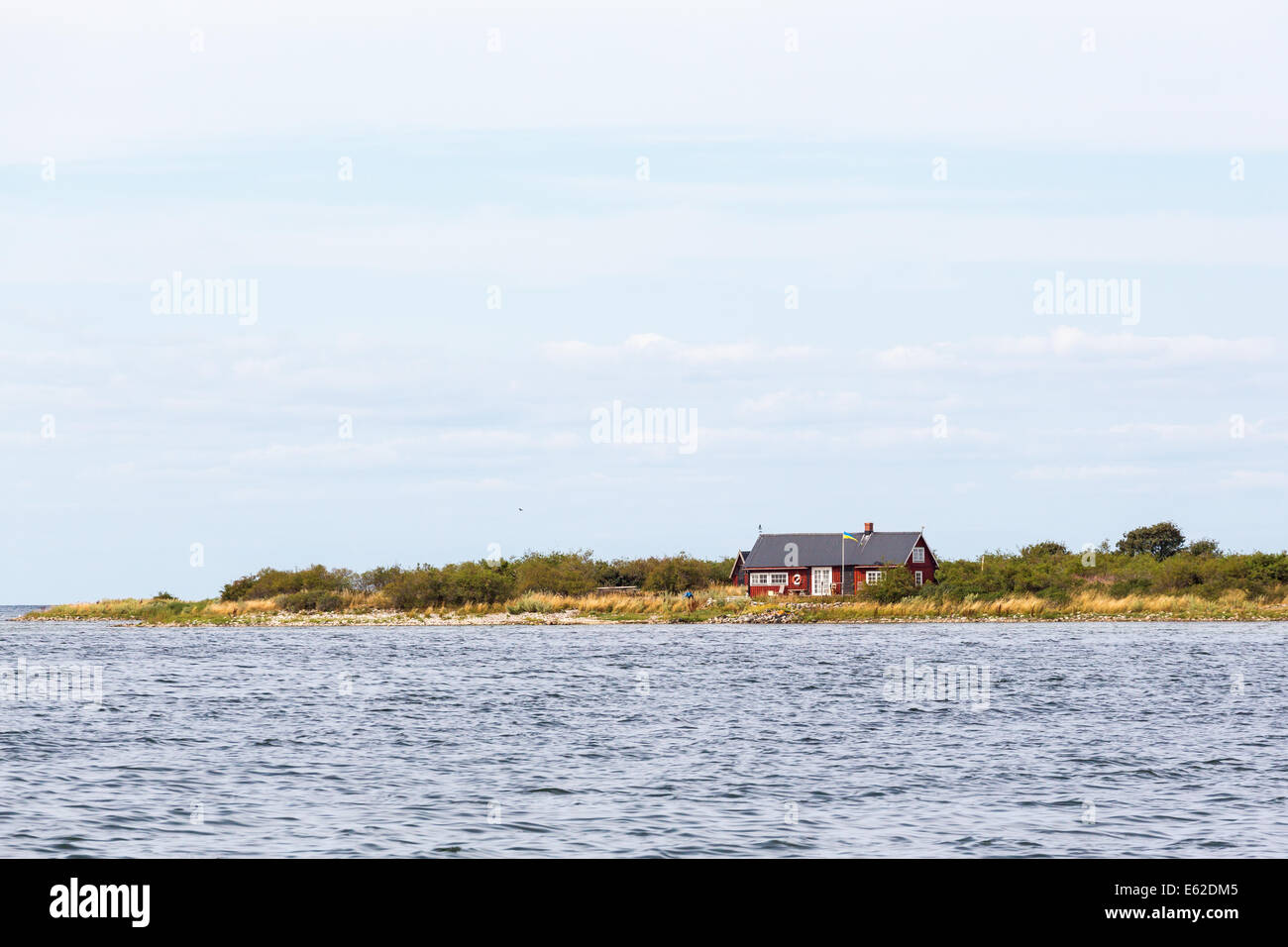 Cottage beach sea hi-res stock photography and images - Alamy