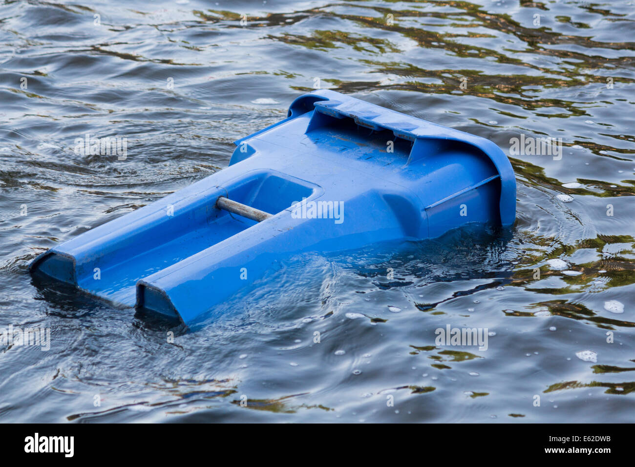 Recycling bin in water Stock Photo - Alamy