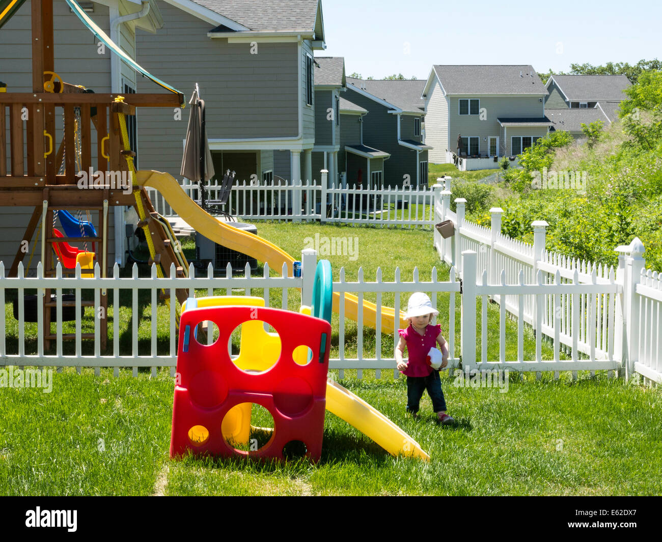 Small Child Plays in Backyard of Army Officer Housing, United States ...