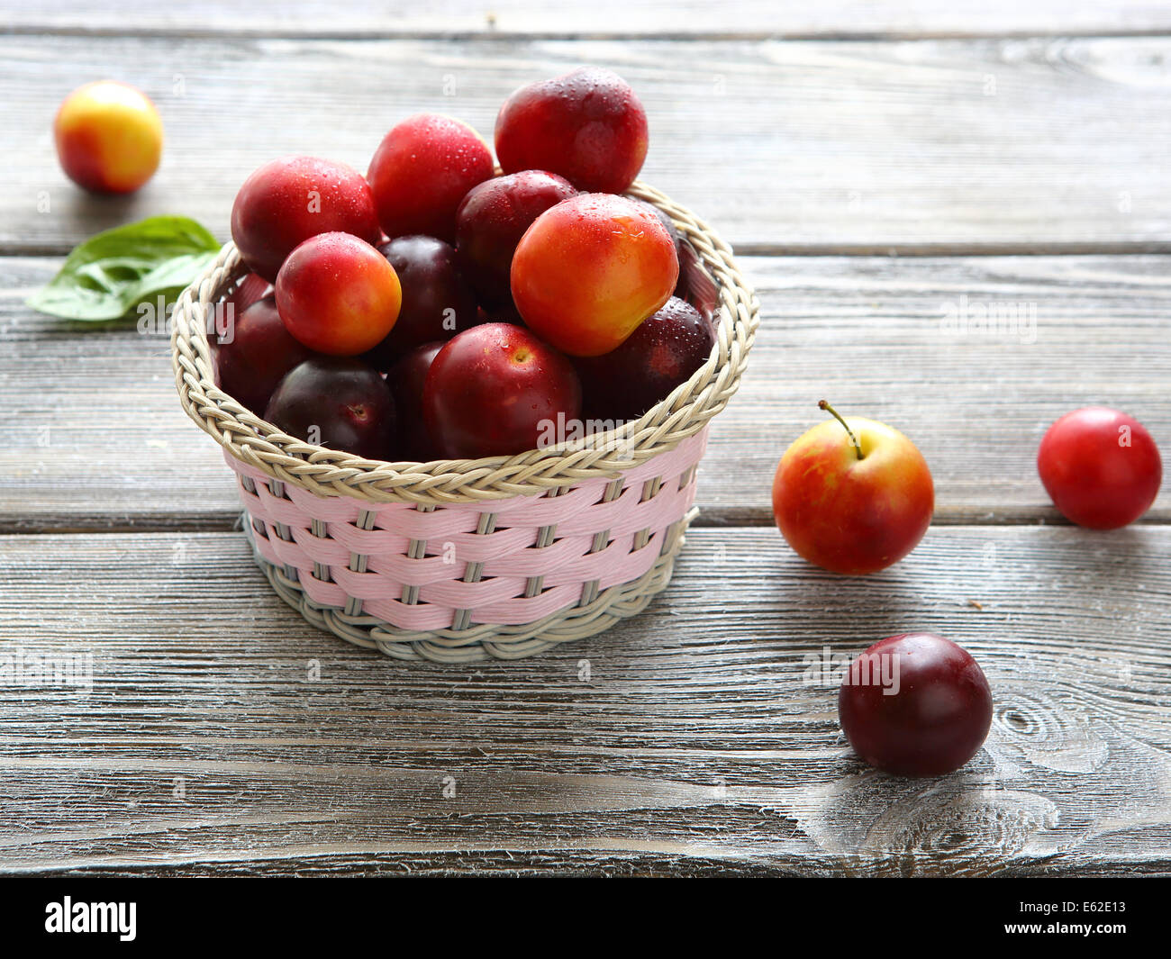 full basket of summer plums, food closeup Stock Photo - Alamy