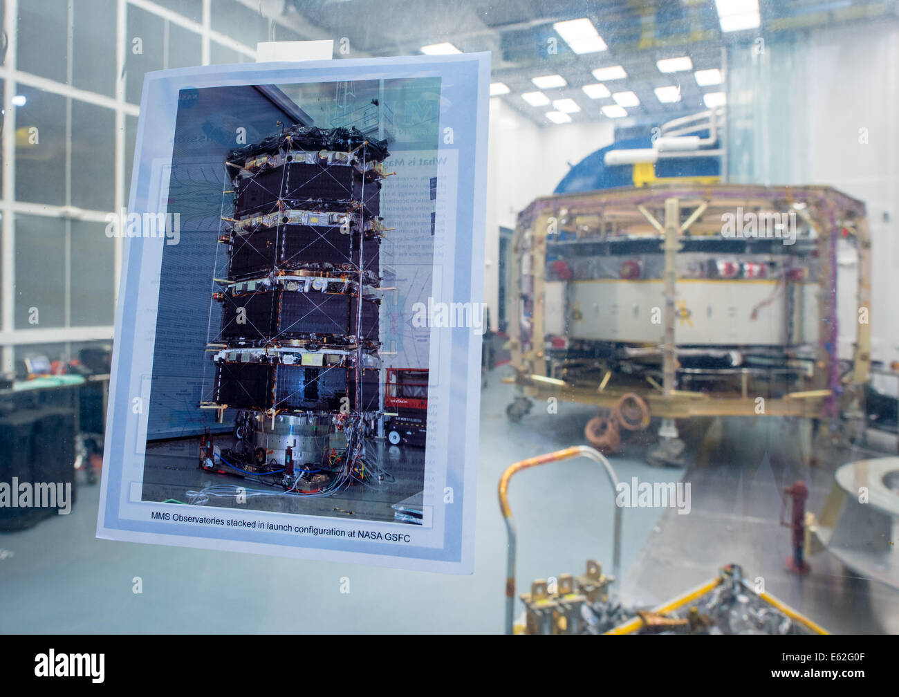 A photo of the four Magnetospheric Multiscale (MMS) spacecraft stacked ...