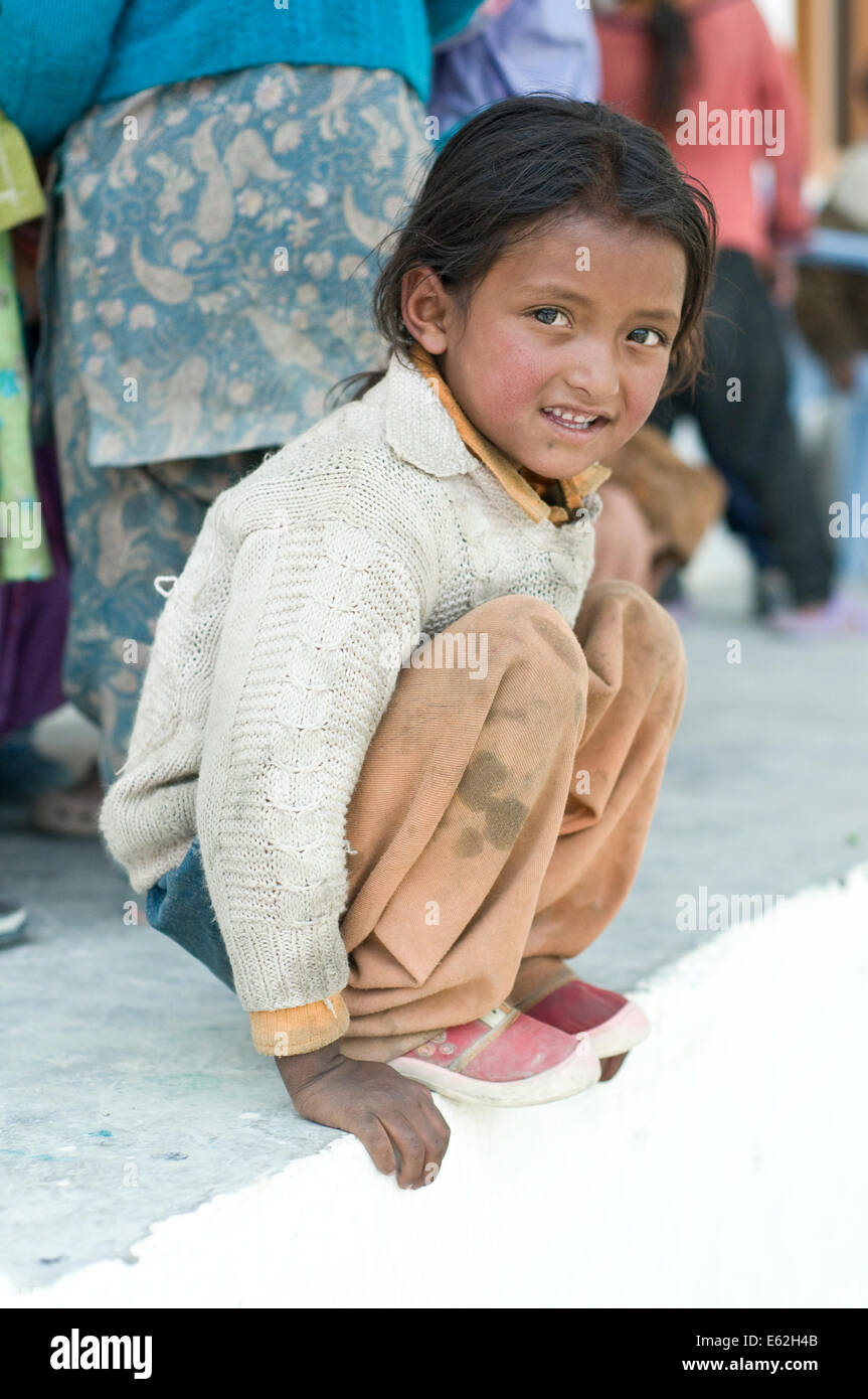 Girl crouching, Dhankar, Spiti valley, India Stock Photo - Alamy