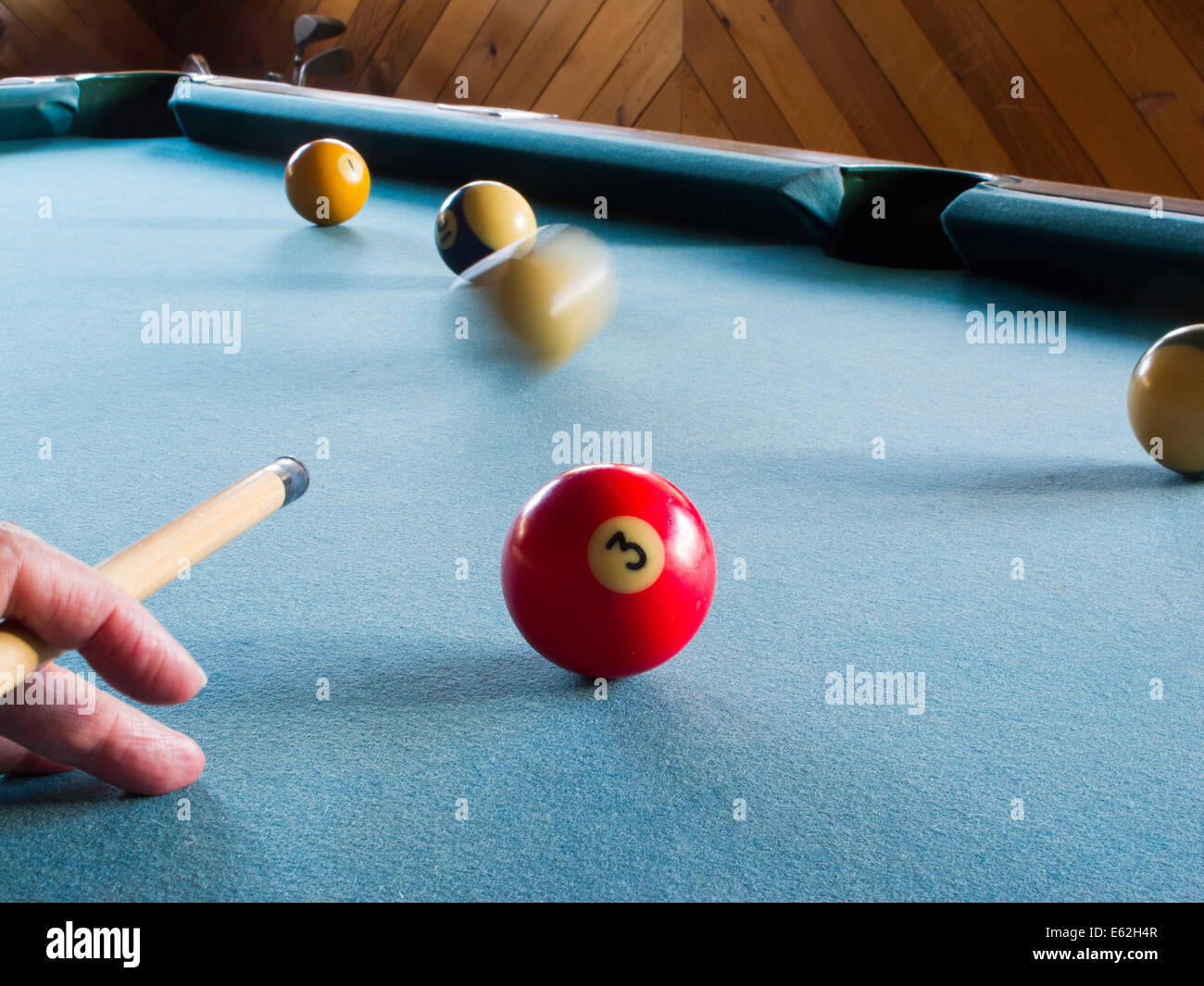 Pool Table with Player Stock Photo - Alamy