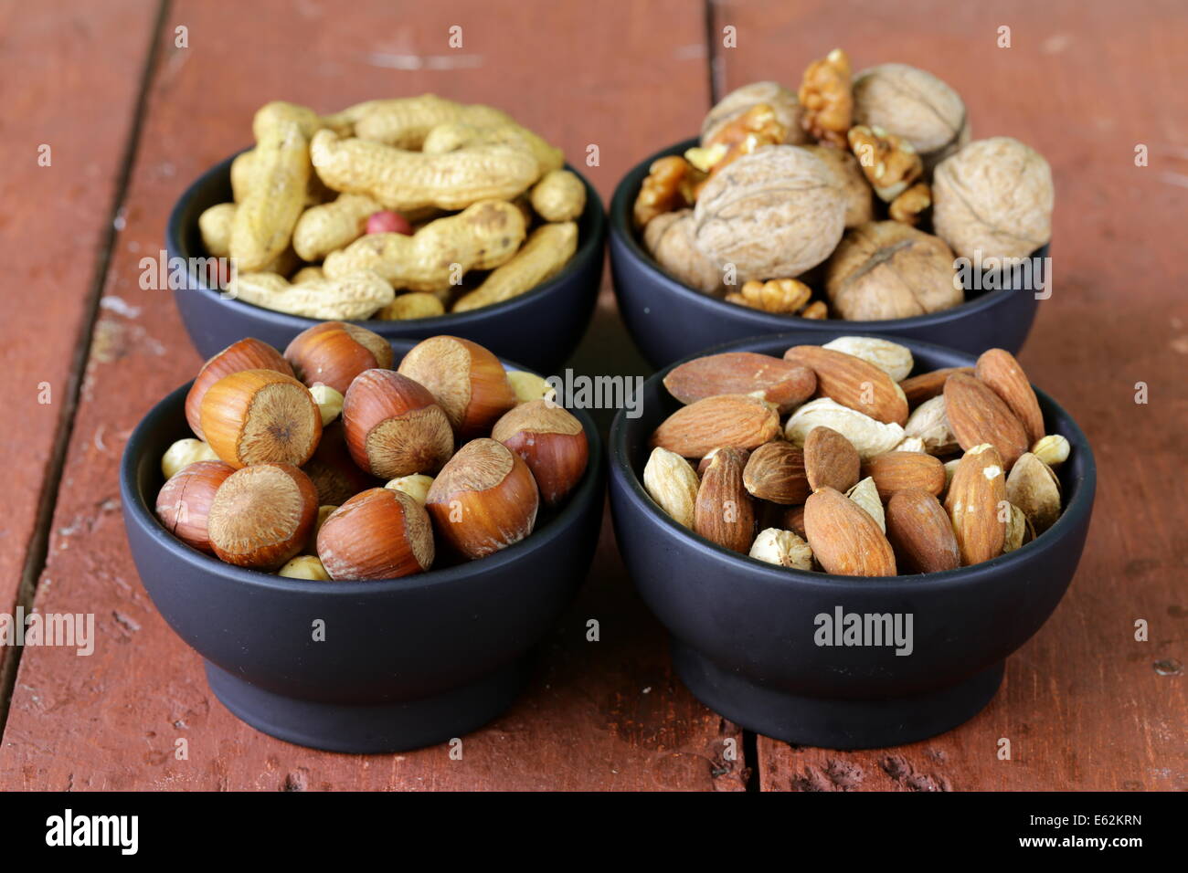 different kinds of nuts (almonds, walnuts, hazelnuts, peanuts) in a ...