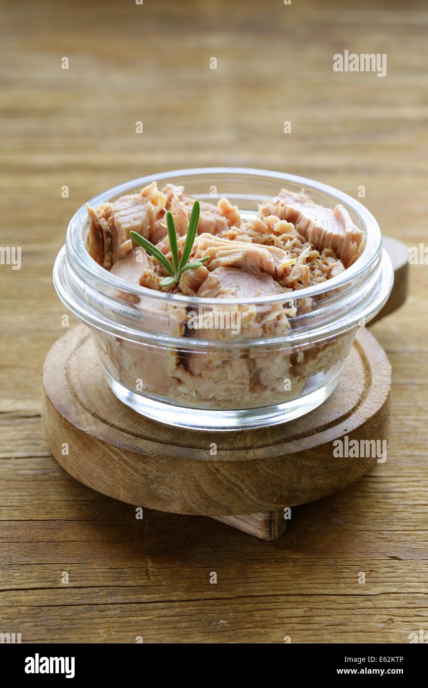 canned tuna with rosemary in a glass jar Stock Photo - Alamy