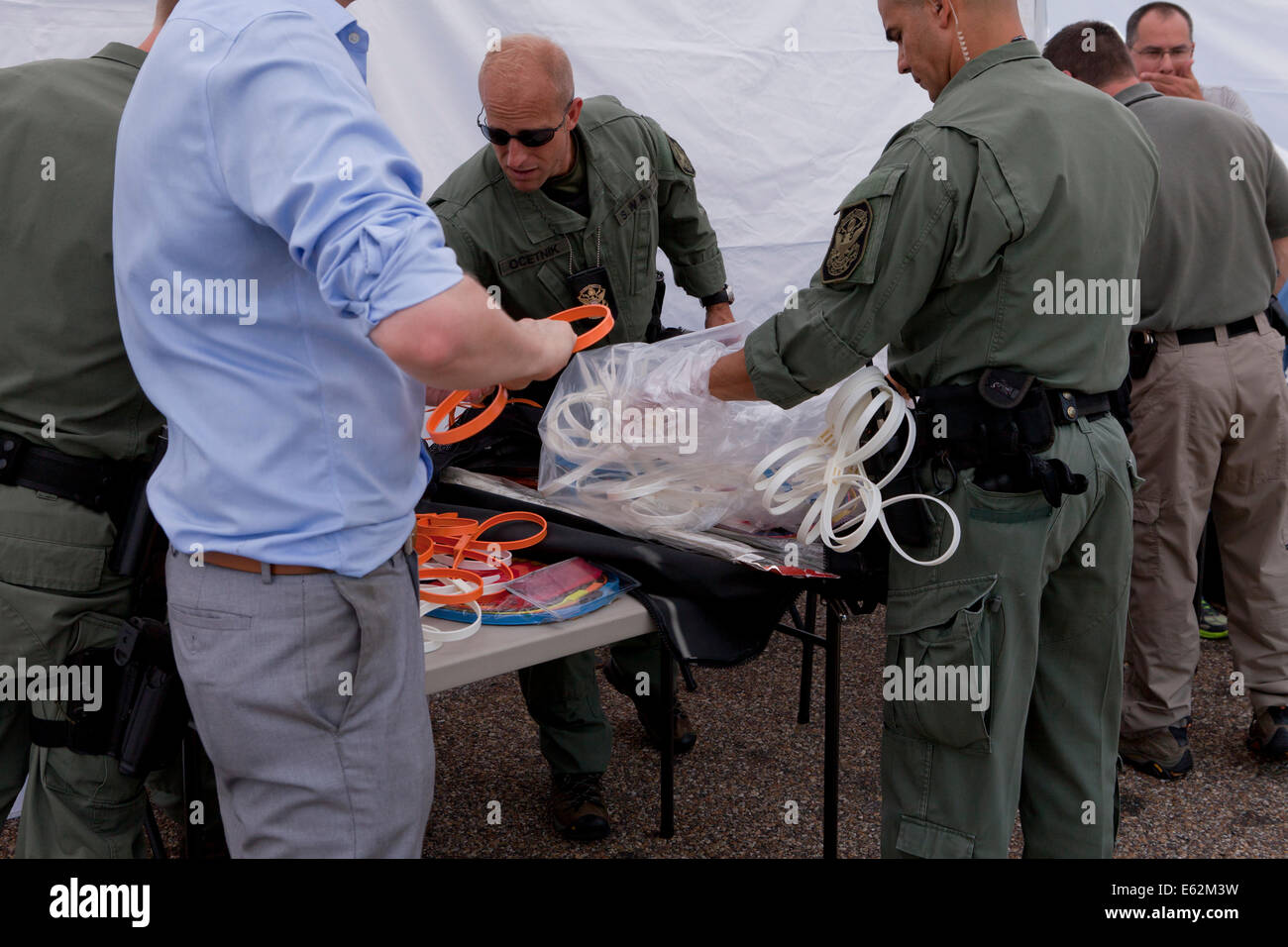 Plastic handcuffs hi-res stock photography and images - Alamy