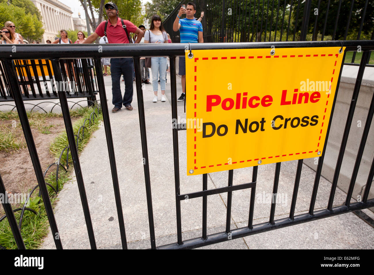 Police line sign on barricade fence - Washington, DC USA Stock Photo ...