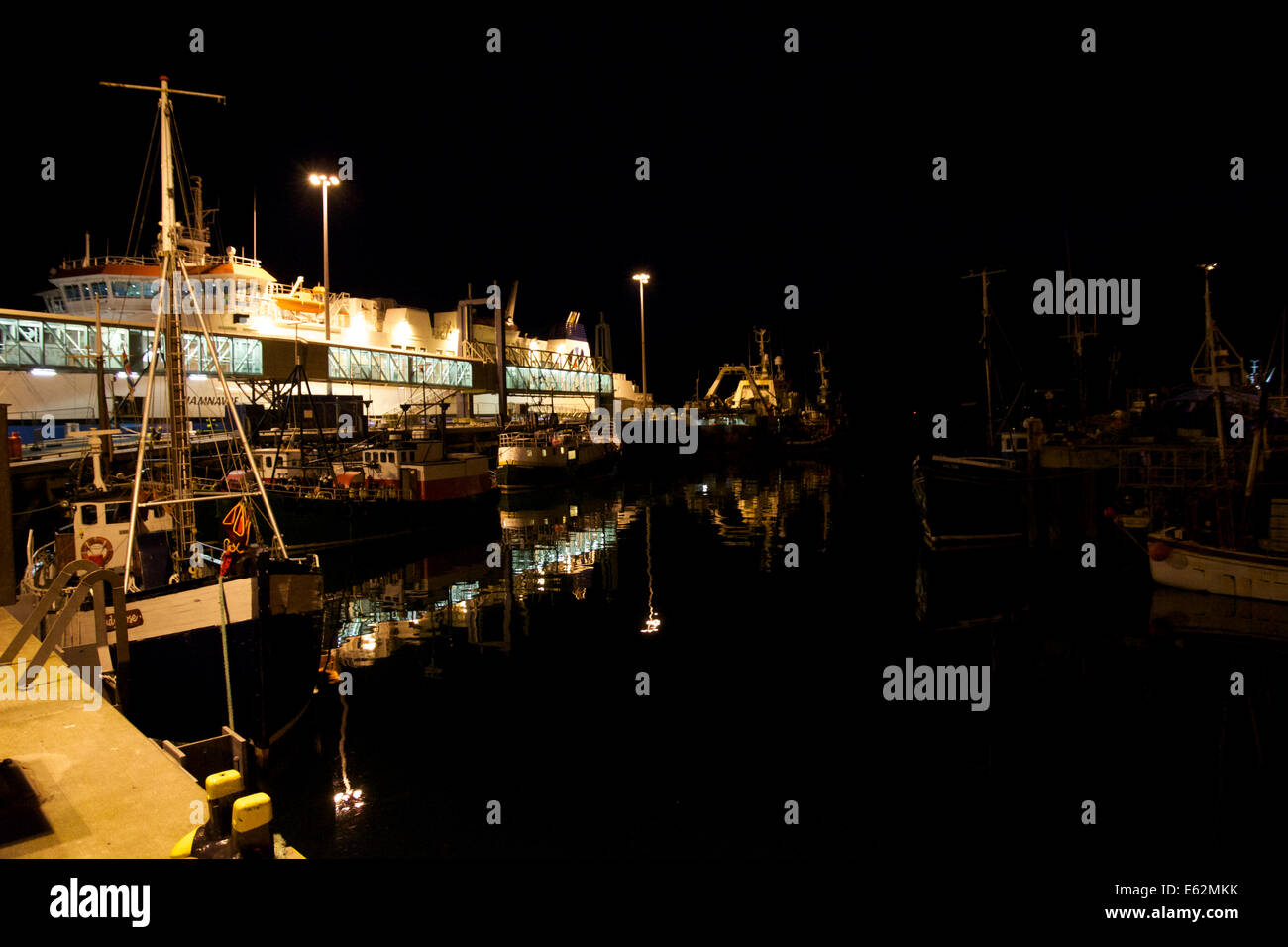 Stromness habour by night with Ferry & Fishing Boats Stock Photo - Alamy